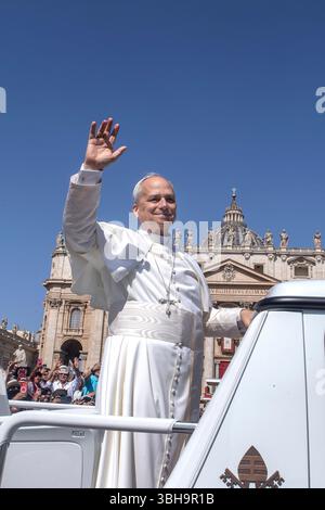 Pope Leo XIV, on his popemobile, tours St. Peter's Square at the ...