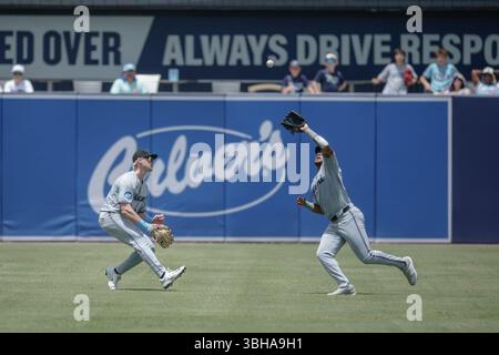 Miami Marlins left fielder Dane Myers (54) breaks his bat in the third ...