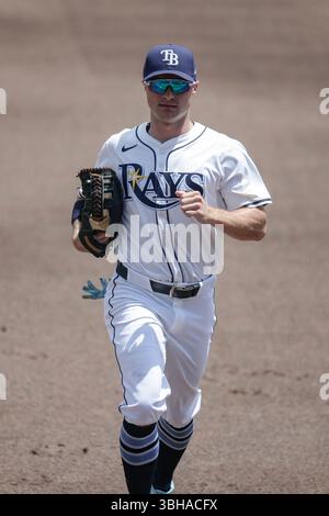 Tampa Bay Rays' Jake Mangum celebrates his inside-the-park home run ...