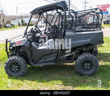 Different off road UTVs, utility task vehicles, lined up for sale at a ...