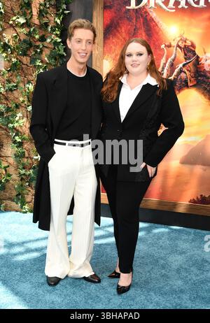 Harry Trevaldwyn and Bronwyn James attend the arrivals of Universal ...