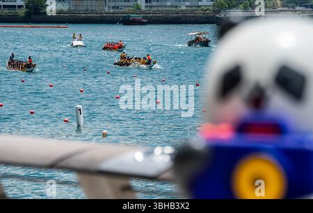 Teams compete during the 7th Dragon Boat Race on the ancient Bianhe ...