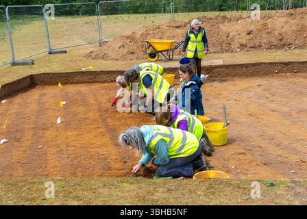 Time Team archaeologists excavating Garden Field at Sutton Hoo, Suffolk ...