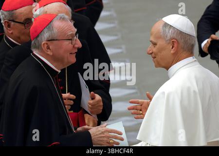 Pope Leo XIV greets cardinal Daniel DiNardo during his weekly general ...