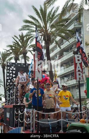 Sitges, Spain – June 8, 2025: People march joyfully in colorful outfits ...