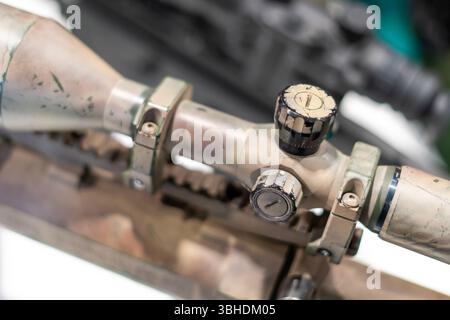 Hunting rifle scopes on display at a show Stock Photo - Alamy