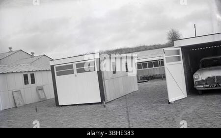 circa late 1950s, historical, prefab garages on display at business ...