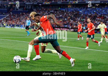 Nuno Mendes and Lamine Yamal seen during UEFA Nations League 2025 final game between national ...