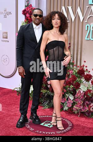 Duane Martin and Ashley Marie Jones attend the 2025 BET Awards at ...