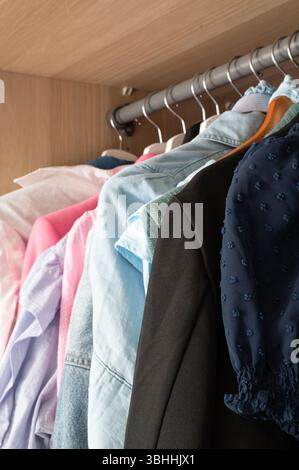 Different assortment of colorful clothing in the modern boutique Stock ...