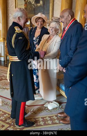 Rugby league star Billy Boston being Knighted by King Charles III at ...
