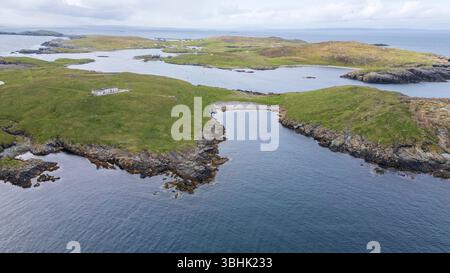 Aerial views of the remote Out Skerries islands off the east coast of ...