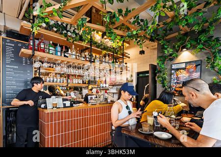 Coffee shop interior, staff and customers, Wan Chai, Hong Kong, SAR ...