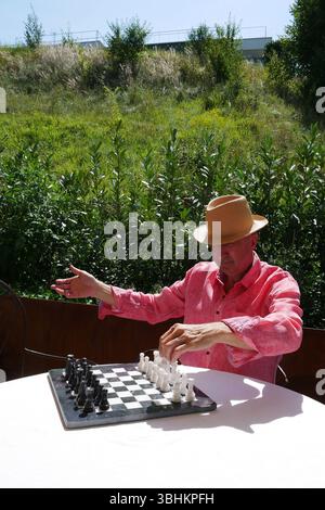 Chess player making his checkmate move Stock Photo - Alamy