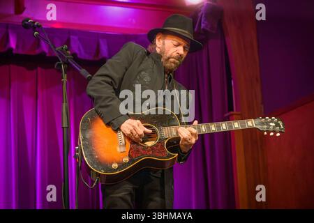 Blues, guitarist, singer, producer, Colin Linden in concert Stock Photo ...