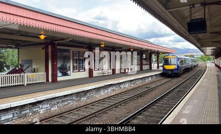 ScotRail passenger trains at Aviemore station, showcasing modern travel ...