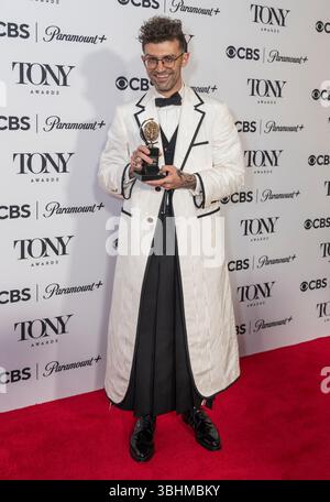 Sam Pinkleton poses with the Best Direction of a Play award for 'Oh ...