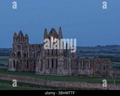 June's rare Strawberry Moon rises over Whitby Abbey and Harbour, Whitby ...