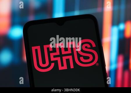 In this photo illustration, Universal Health Services, Inc. (UHS) logo ...
