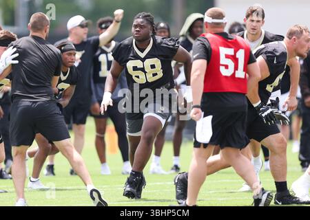 New Orleans Saints guard Torricelli Simpkins III (68) blocks ...