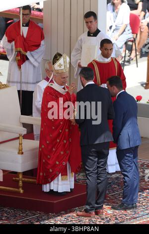 Pope Leo XIV blesses faithful during the Angelus noon prayer from the ...