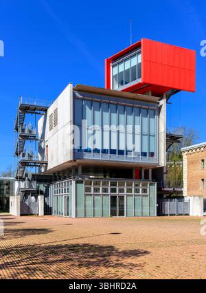 Tour Signal is a bright red, trapeziod-shaped building by architect ...