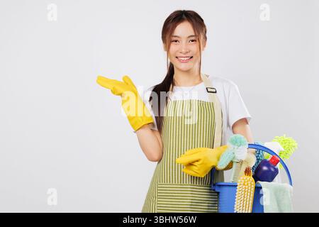 Cleaning items visible while woman demonstrates with her palm Stock ...