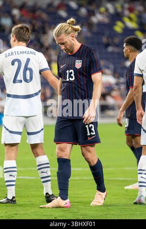 United States defender Tim Ream (13) kicks the ball against Trinidad ...
