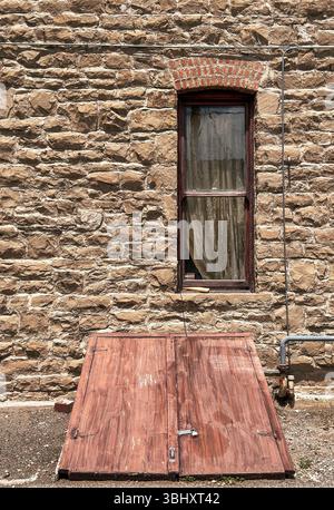 Building built 1900 with sandstone block walls, Windows have red brick ...