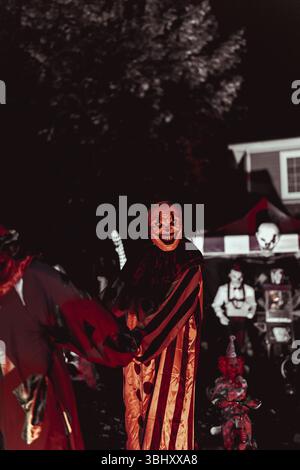 Creepy Halloween Clown Scene with Kissing Booth and Carnival Setup ...