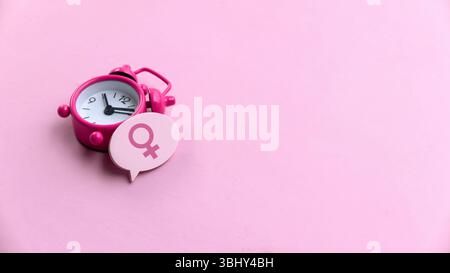 Menopause concept. Women symbol over a watch. Healthcare and medical ...