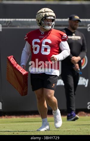 San Francisco 49ers center Drake Nugent (66) snaps the ball during an ...
