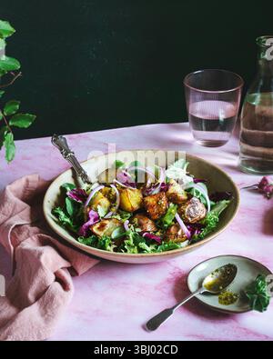 Bowl with delicious potato salad on table Stock Photo - Alamy