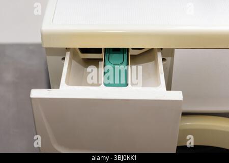 part of washing machine and laundry powder for washing day Stock Photo ...
