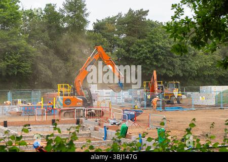 Miller homes residential building site with dusty diggers and ground ...