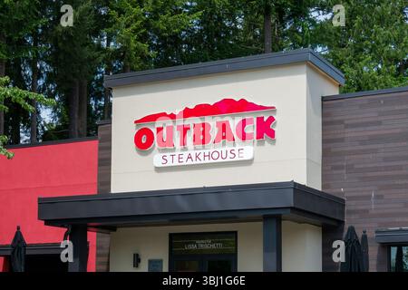 BOTHELL, WA, USA, MAY 25, 2025:Outback Steakhouse restaurant exterior ...