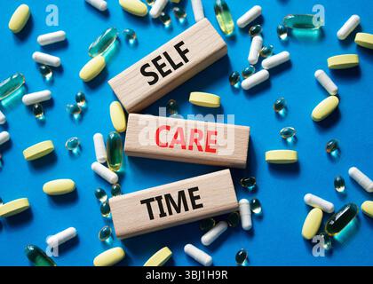 Self-care Time symbol. Concept words Self-care Time on wooden blocks ...