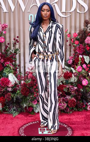 Muni Long arrives at the BET Awards on Sunday, June 26, 2022, at the ...