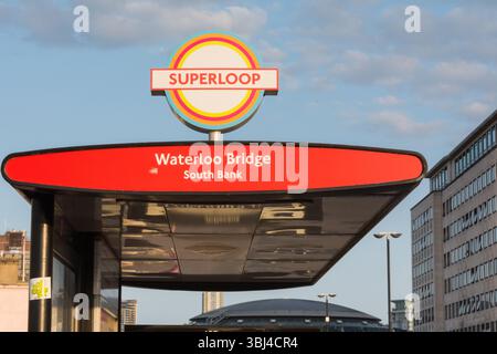 Closeup of a colourful TFL Superloop Roundel on Waterloo Bridge, London ...