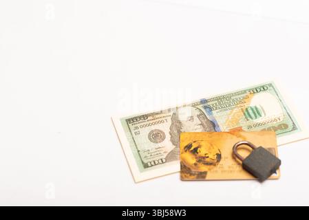 Paper currency dollar credit card and lock isolated on white background ...