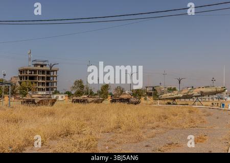 Armored vehicles and Sukhoi Su-22 fighter-bomber at the grounds of ...