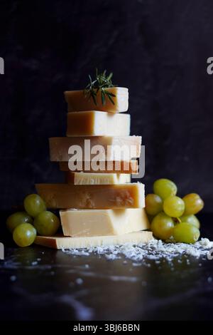 Italian aged gourmet cheeses, Parmigiano Reggiano and Gran Padano, with ...