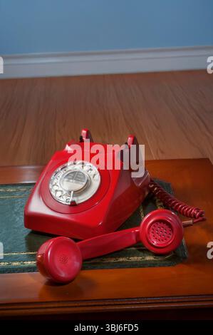 Phone off the hook Classic 1960s-1970’s retro red dial telephone with ...