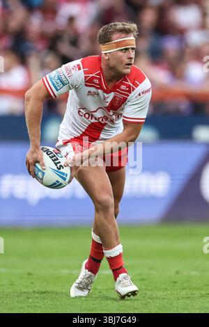 Jez Litten (14) of Hull KR evades the tackle of Rob Mulhern #19 of ...