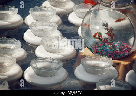carnival ball toss game, throw a ping pong ball in the fish bowl and ...