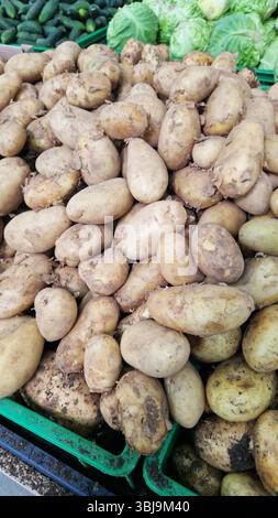 many potatoes in the supermarket Stock Photo - Alamy