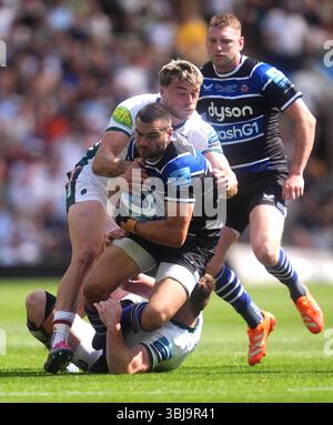 Bath Rugby's Will Muir is tackled by Northampton Saints' Tommy Freeman ...