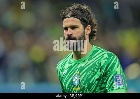 Brazil goalkeeper Alisson Becker (1) celebrates with teammate ...