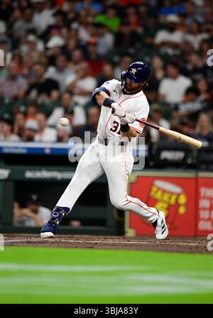 Houston Astros' Jacob Melton (31) steals second base ahed of a throw to ...