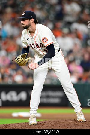 Houston Astros relief pitcher Bennett Sousa walks near the mound after ...